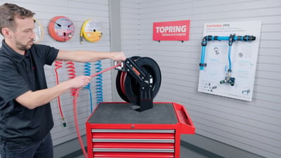 How to Adjust the Spring Tension of a Hose Reel